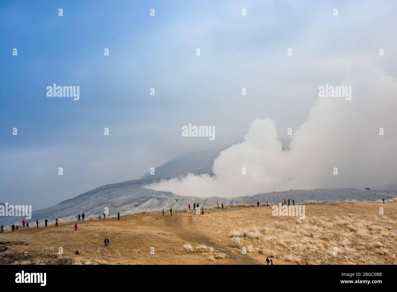 Mount Aso and Kusasenri in winter. covered by golden yellow grassland - Kumamoto, Japan Stock ...
