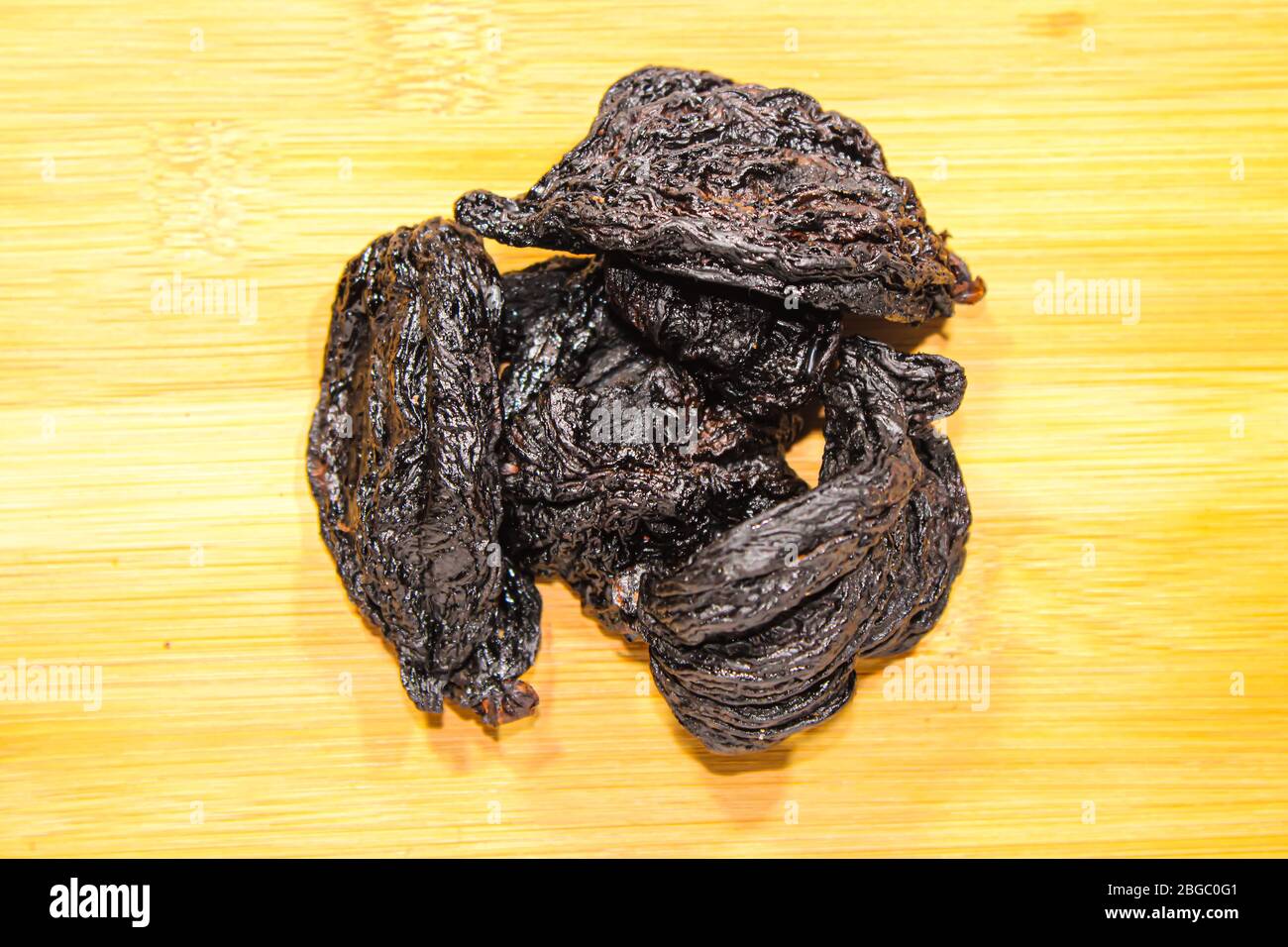 Garcinia cambogia, as well as brindleberry, Malabar tamarind, and kudam ...