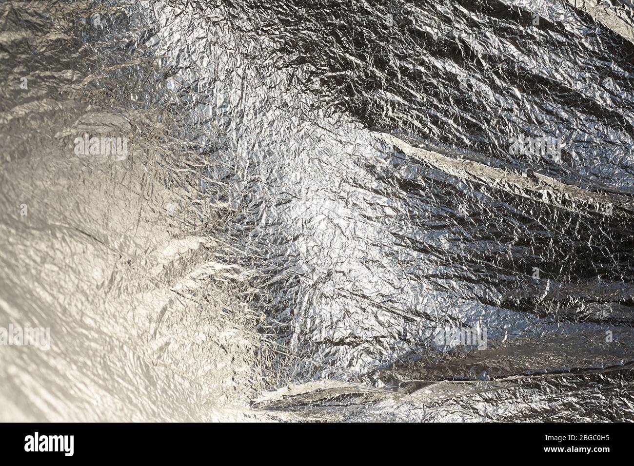 Texture of a thin crumpled sheet of foil. Crumpled foil background ...
