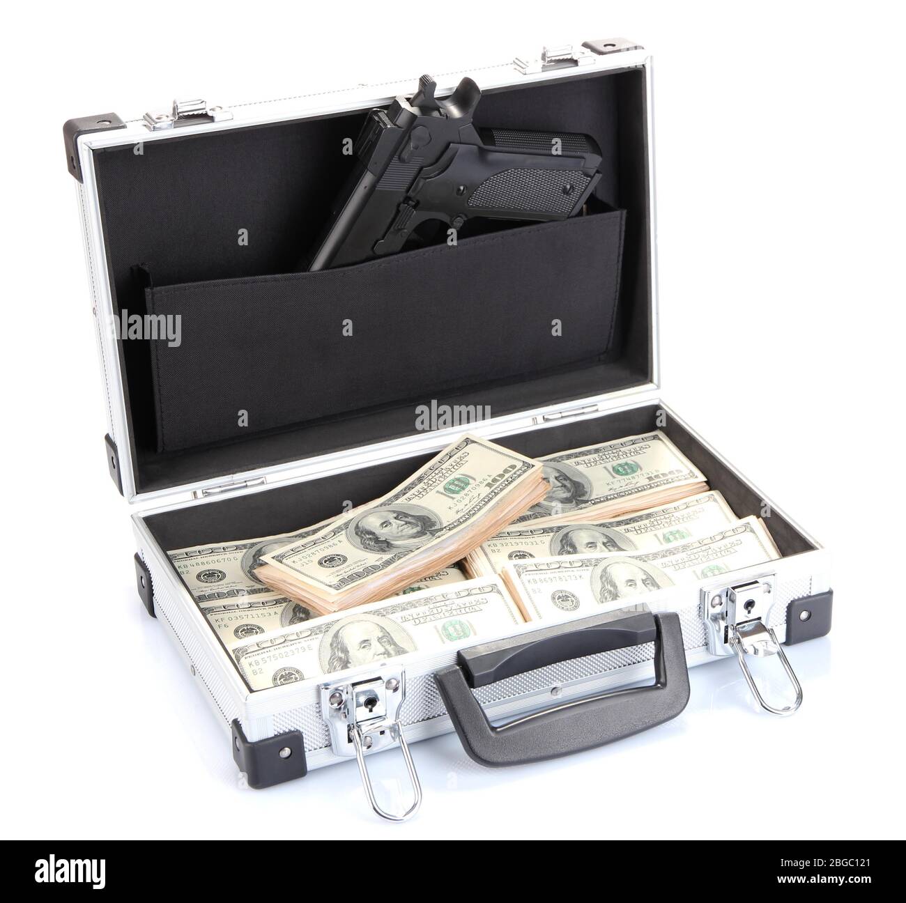 Case with money and gun, isolated on white Stock Photo - Alamy