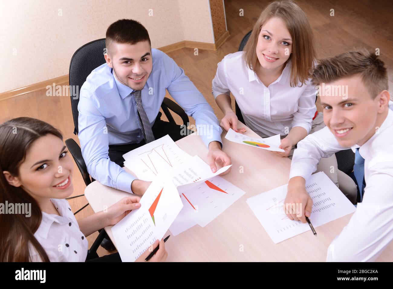 Formal meeting business partners share hi-res stock photography and ...