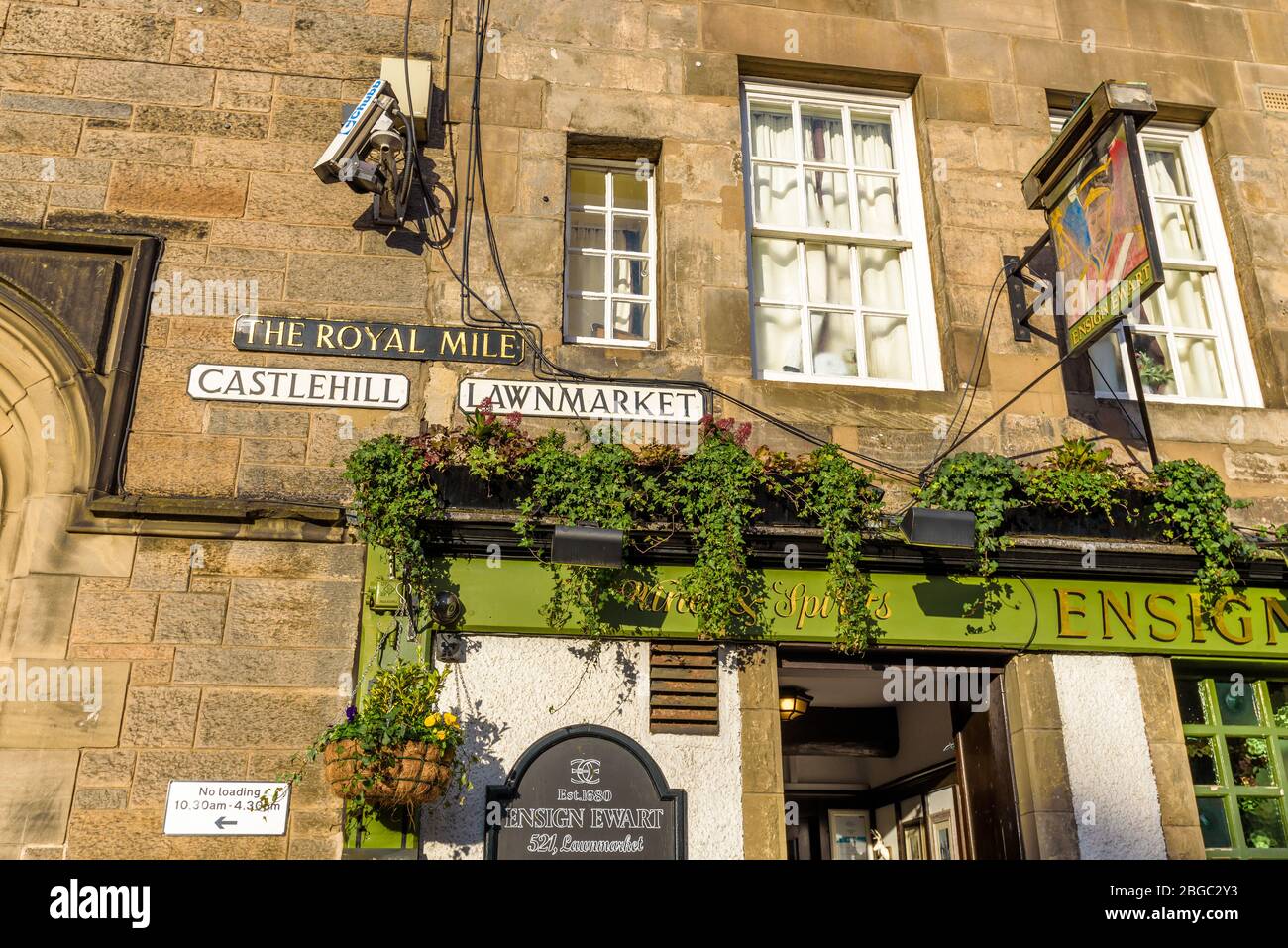 Edinburgh, Scotland - Dec 2018. View of street signs on the Royal Mile ...