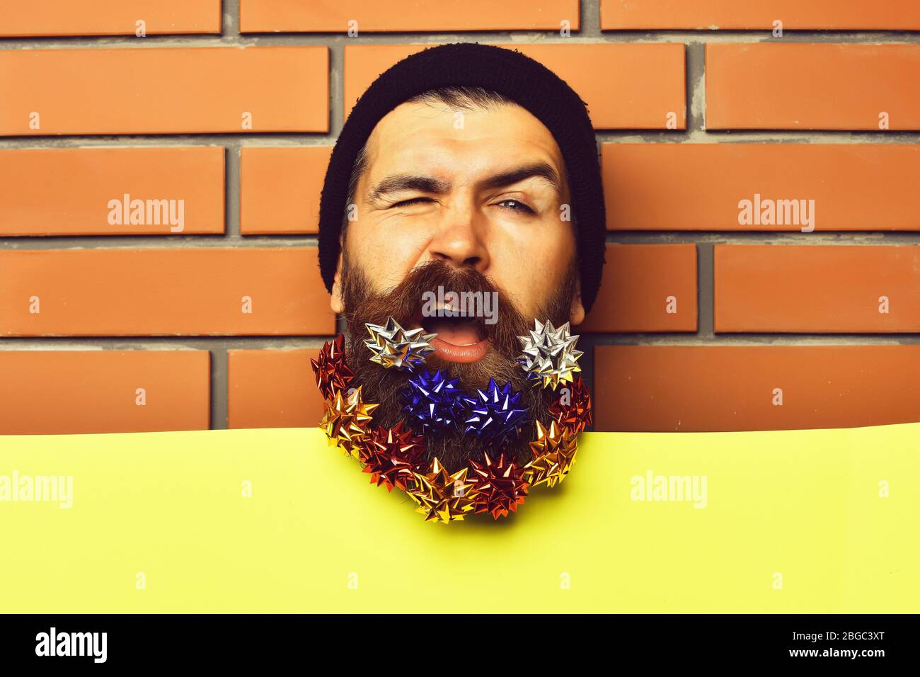 Bearded man, long beard. Brutal caucasian squinting hipster with ...