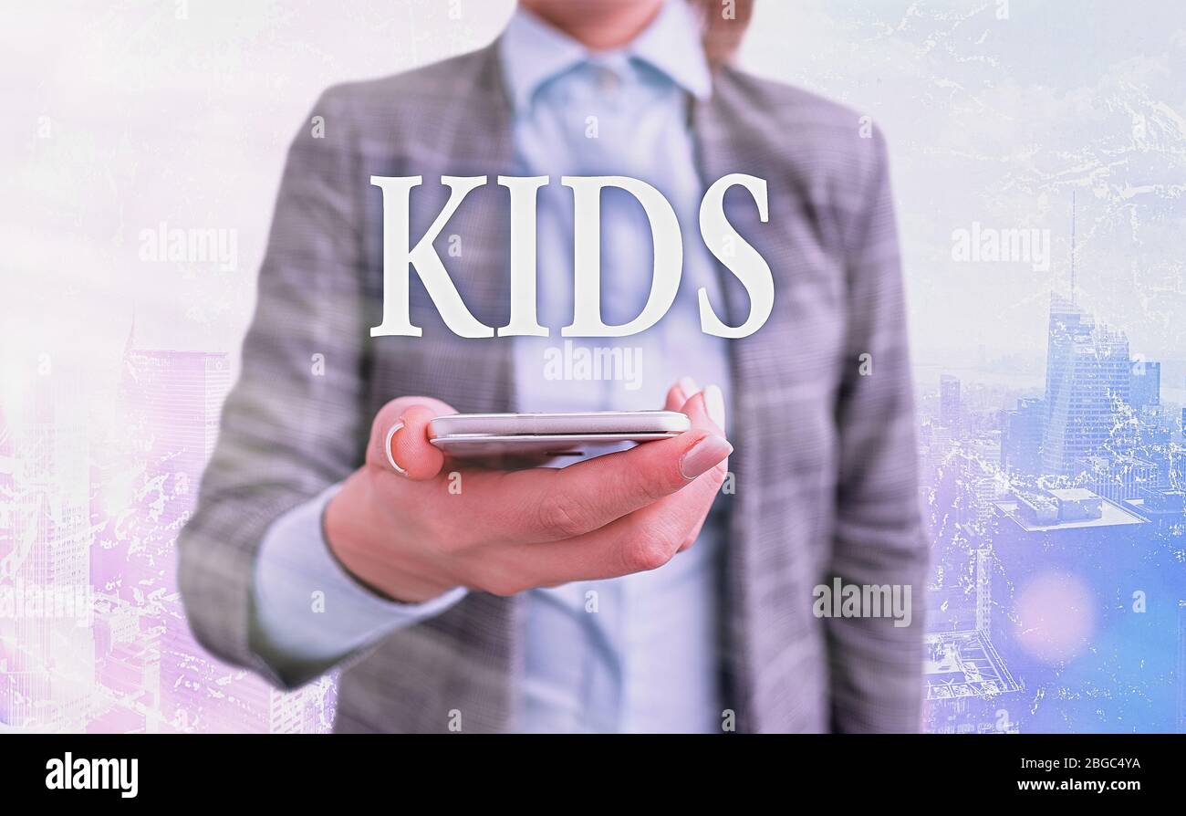 Conceptual hand writing showing Kids. Concept meaning a young being ...