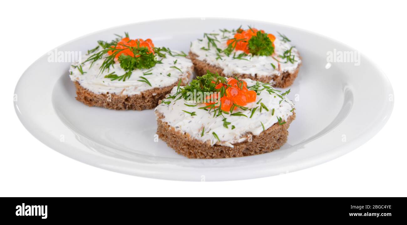 Delicious canapes on plate isolated on white Stock Photo - Alamy
