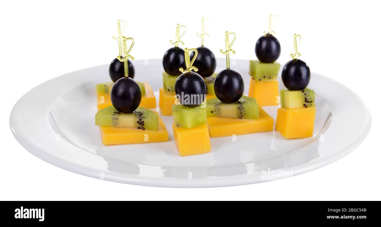 Delicious canapes on plate isolated on white Stock Photo - Alamy