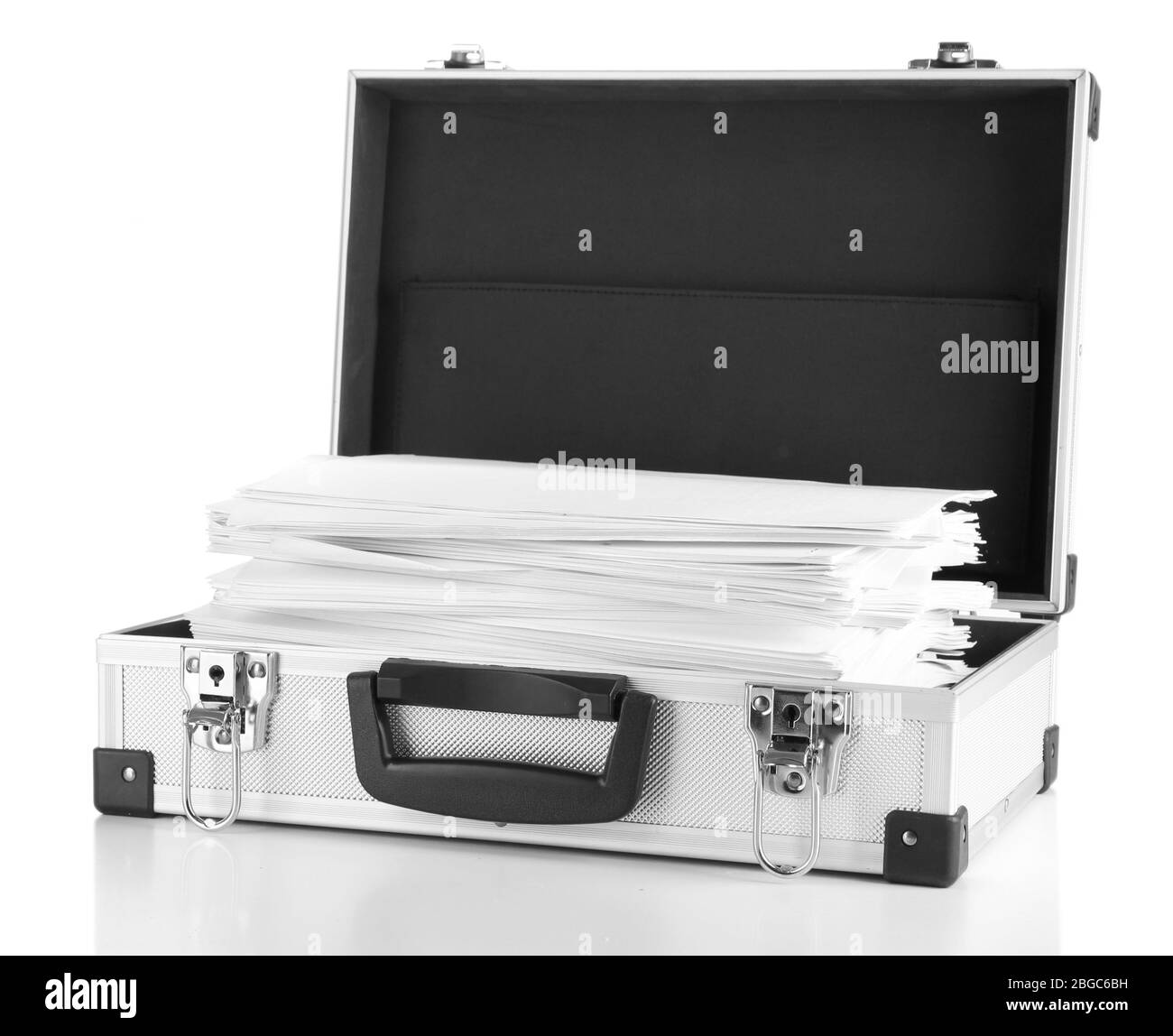Briefcase full of papers, isolated on white Stock Photo - Alamy