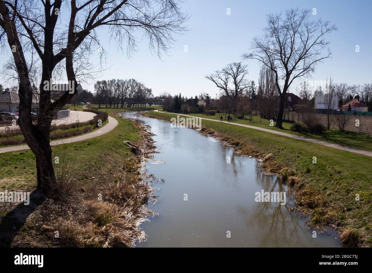 Arc of the Black river, situated in a small valley, lined by grass and ...