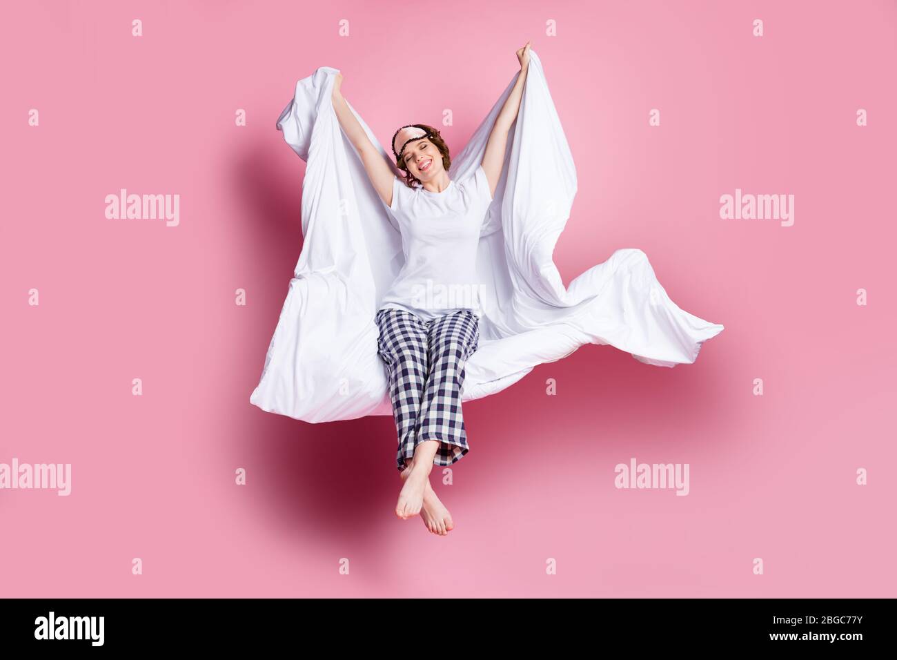 Full body photo of funny lady early morning sit bed hold warm blanket ...