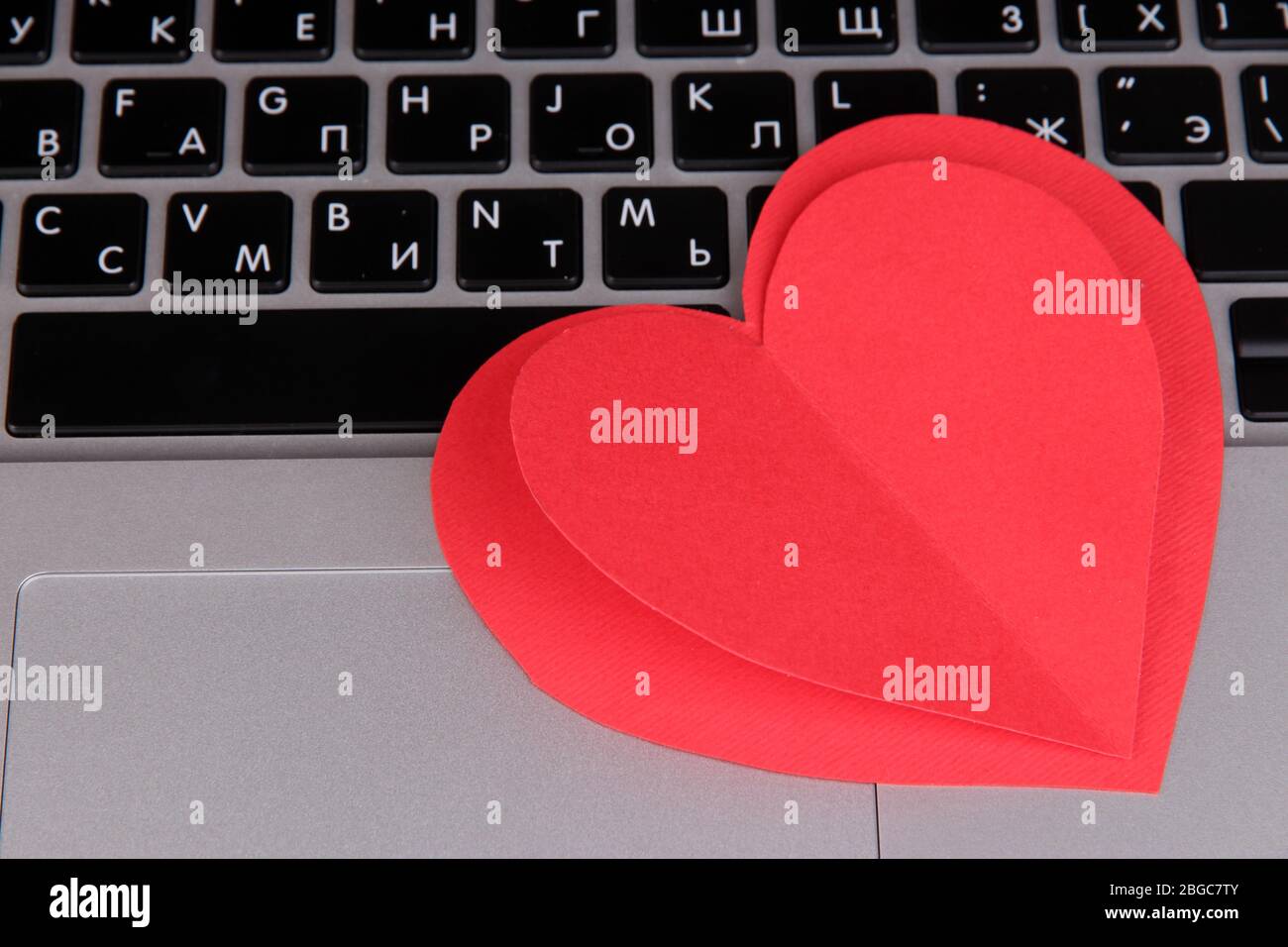 Red hearts on computer keyboard close up Stock Photo - Alamy