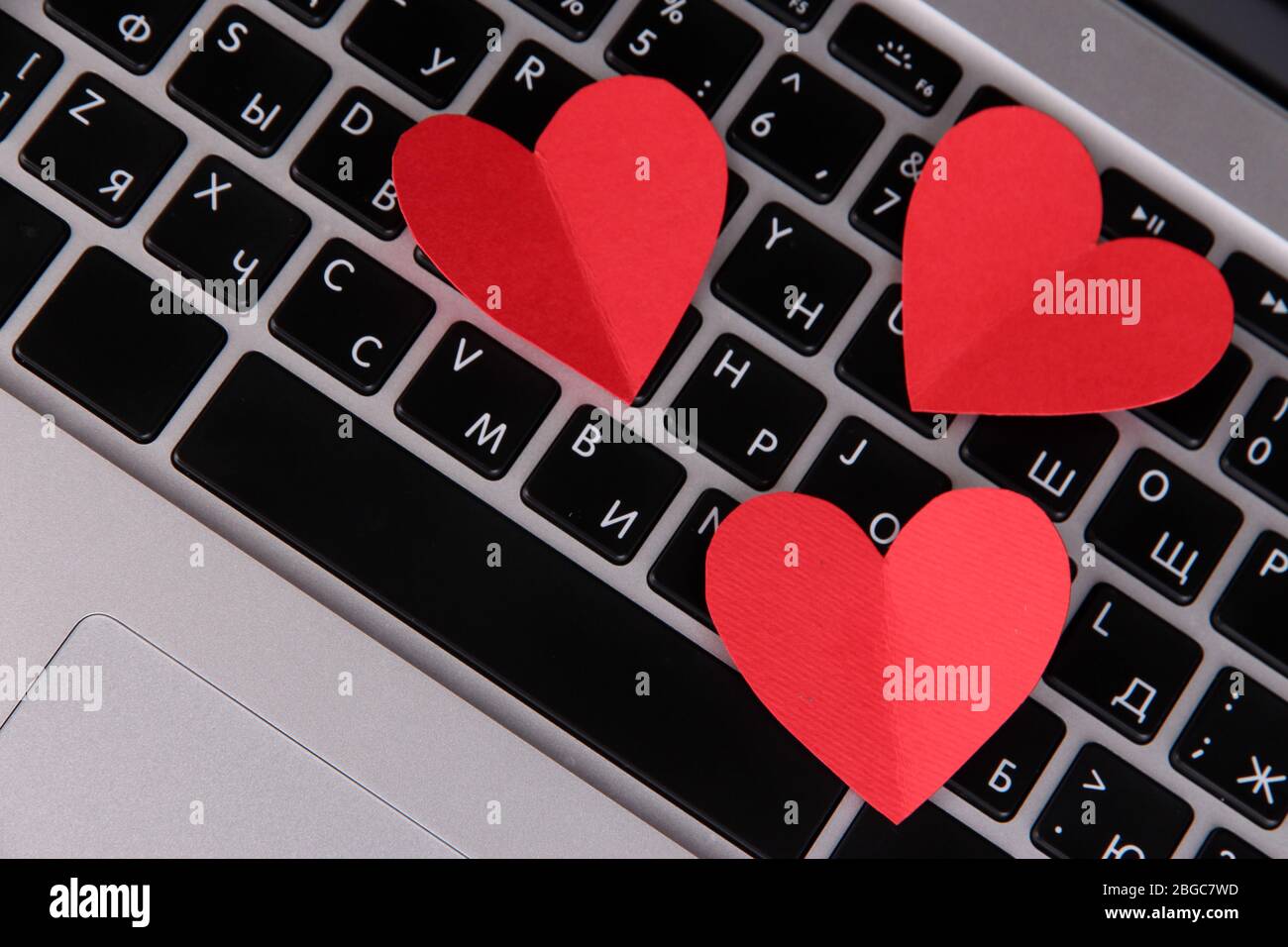 Red hearts on computer keyboard close up Stock Photo - Alamy