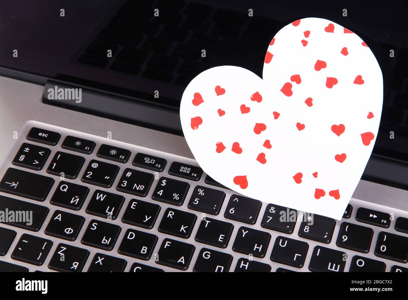 Bright heart on computer keyboard close up Stock Photo - Alamy