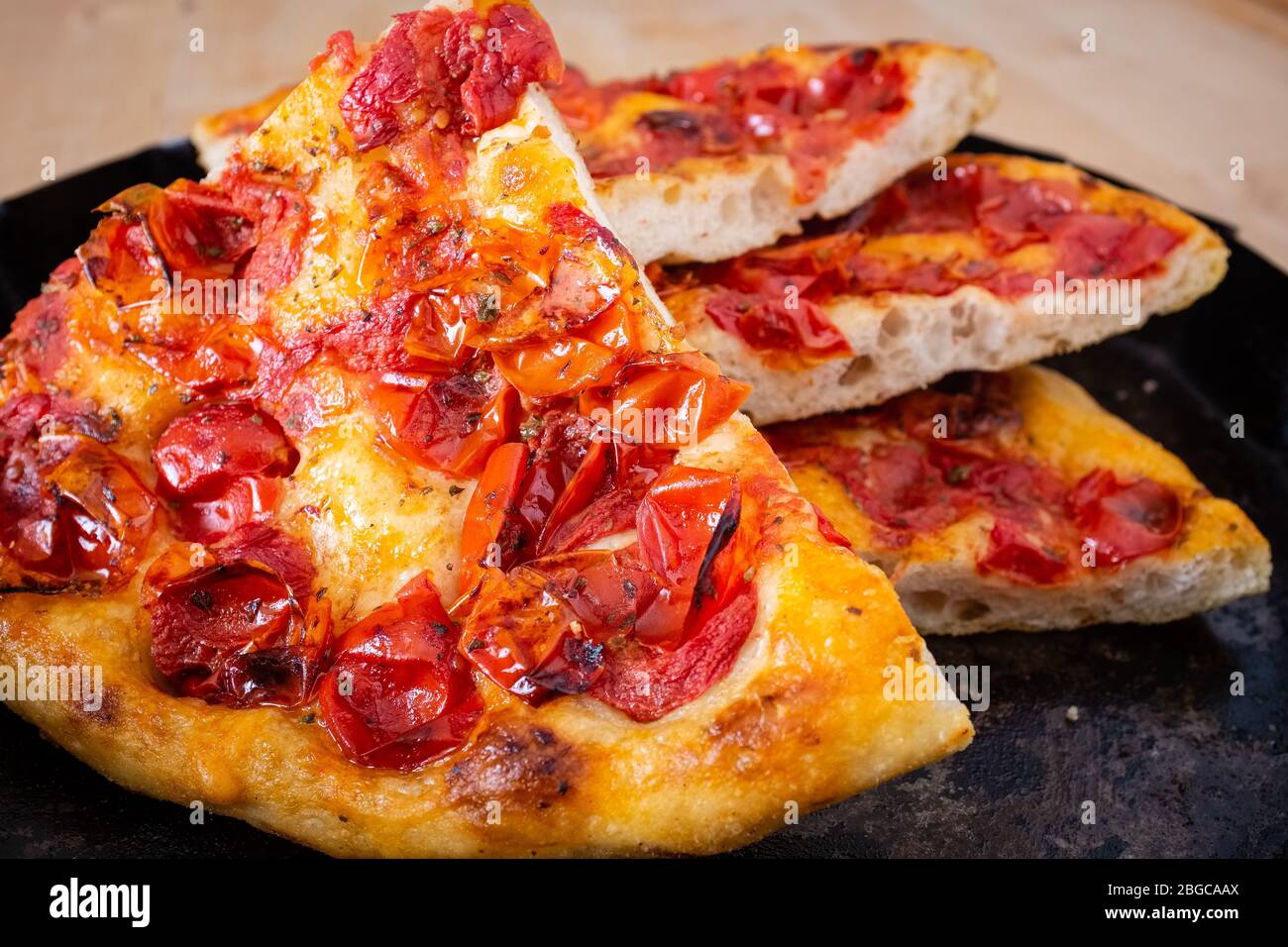 Traditional focaccia bread of Bari made with flour and tomatoes Stock ...
