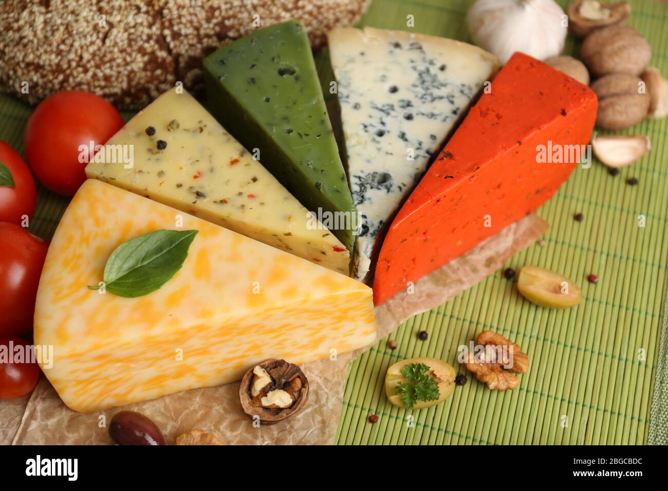 Different Italian cheese on wooden table Stock Photo - Alamy