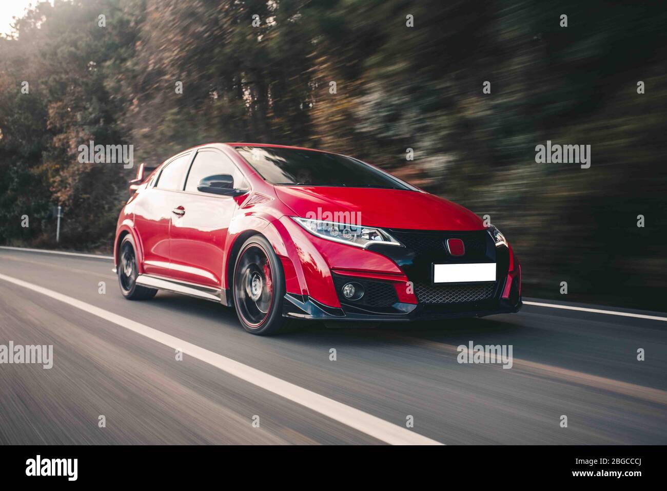 Red supercar touring on the highway in a hot sumer day Stock Photo - Alamy