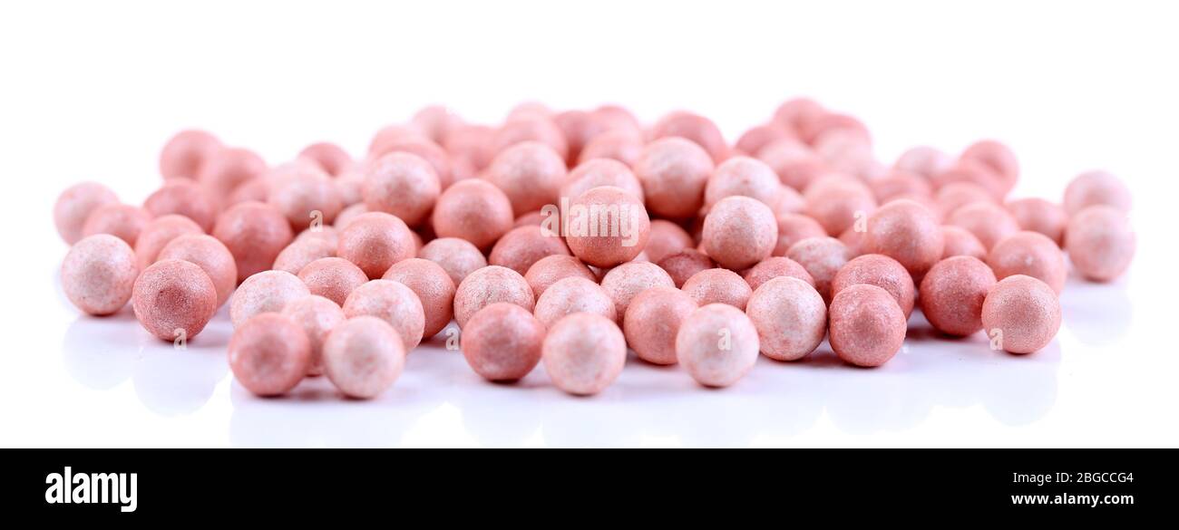 Powder balls isolated on white Stock Photo - Alamy