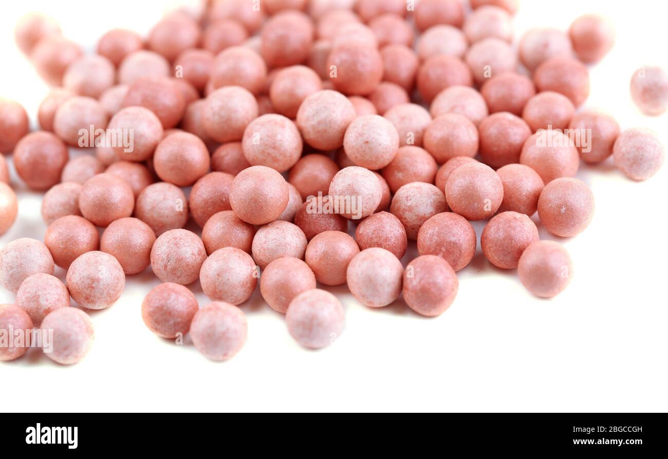 Powder balls isolated on white Stock Photo - Alamy