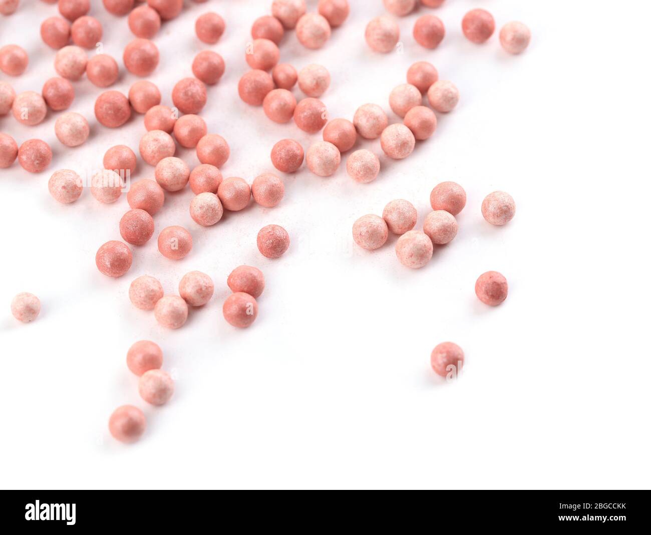 Powder balls isolated on white Stock Photo - Alamy