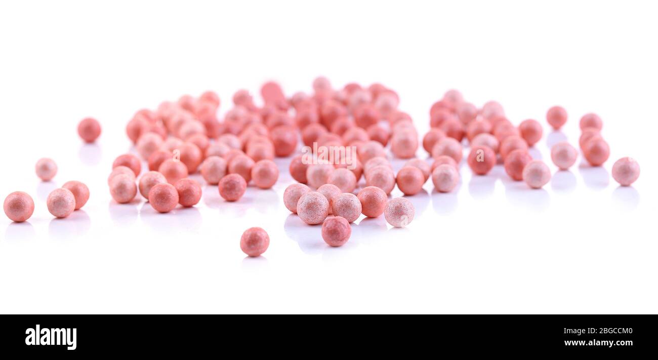 Powder balls isolated on white Stock Photo - Alamy