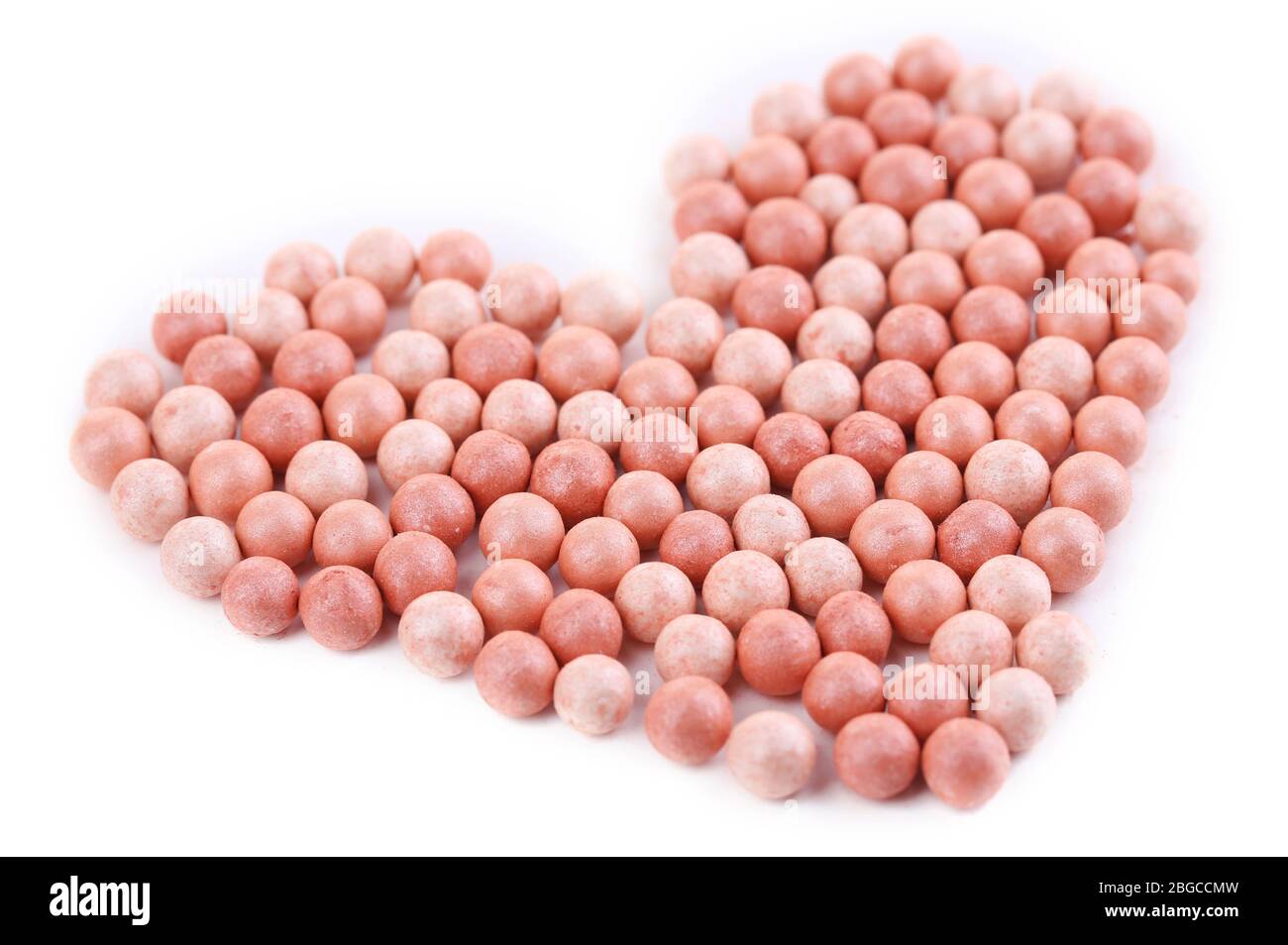 Powder balls isolated on white Stock Photo - Alamy