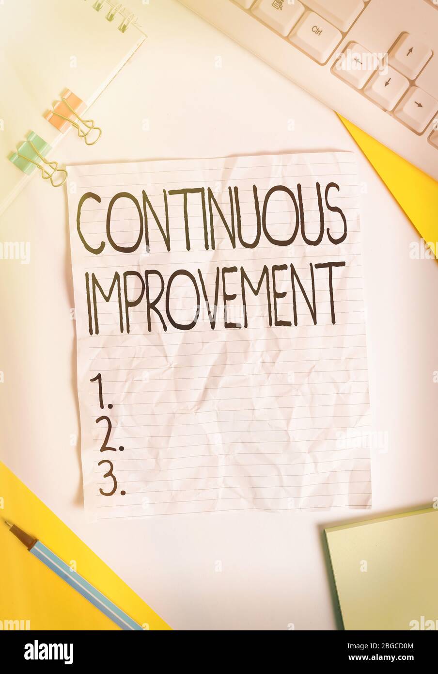 Writing note showing Continuous Improvement. Business concept for ...