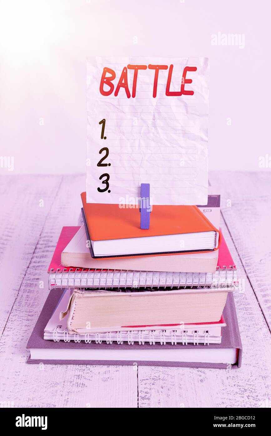 Writing note showing Battle. Business concept for violent fight between ...