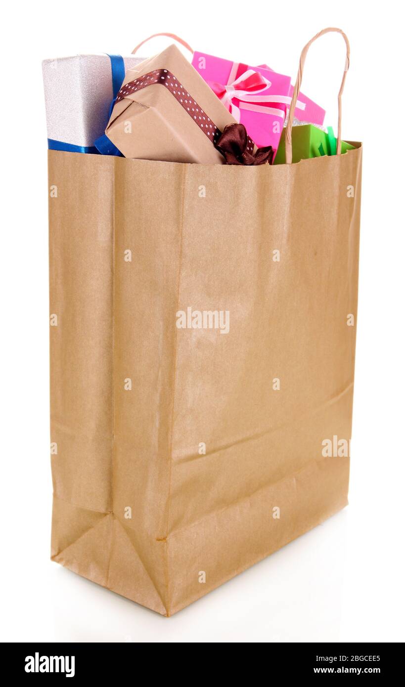 Presents in paper bag isolated on white Stock Photo - Alamy