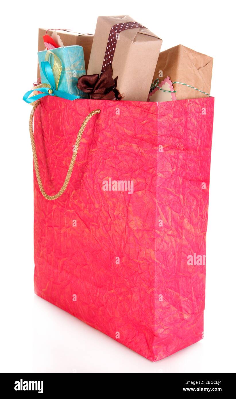 Presents in paper bag isolated on white Stock Photo - Alamy