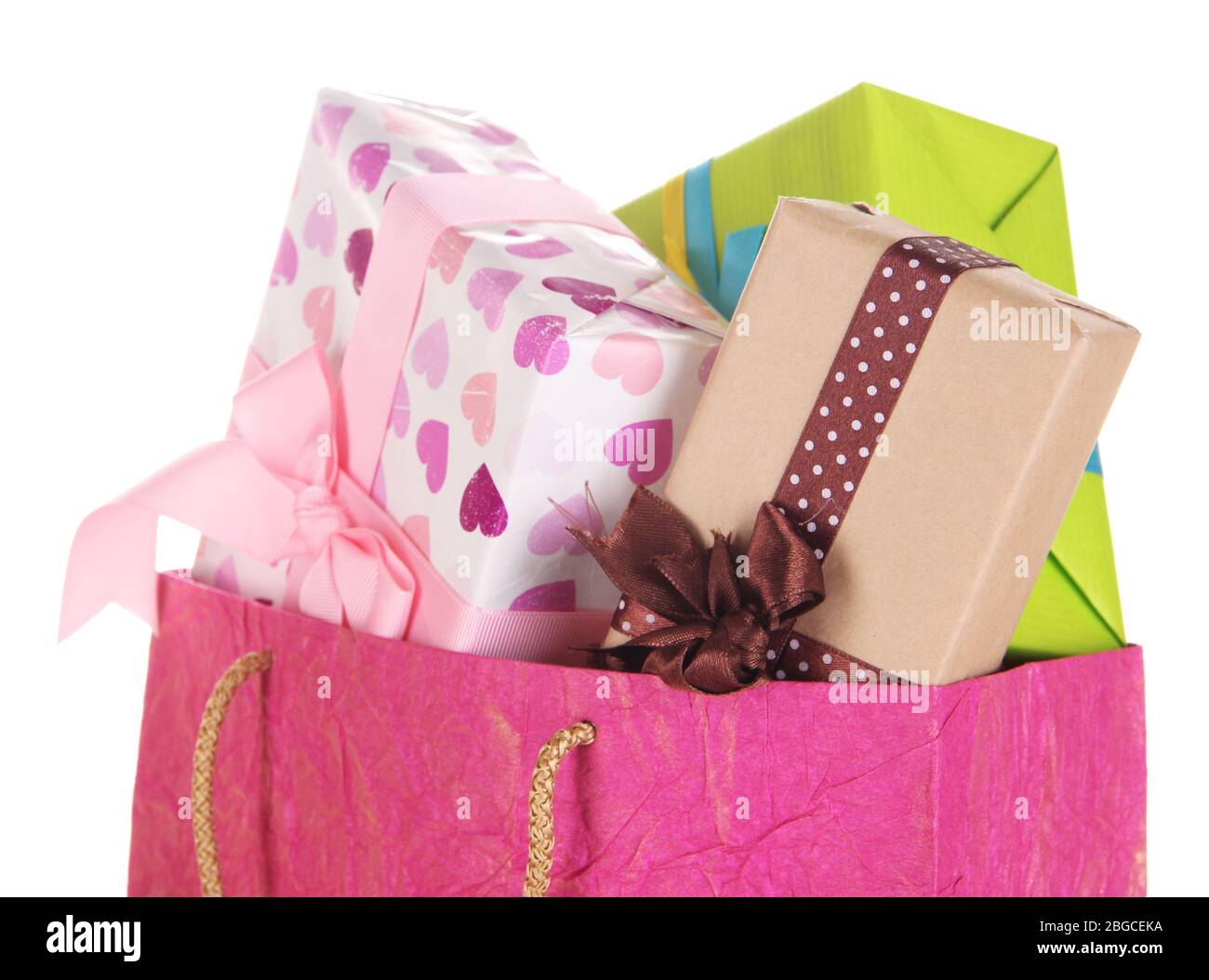 Presents in paper bag isolated on white Stock Photo - Alamy