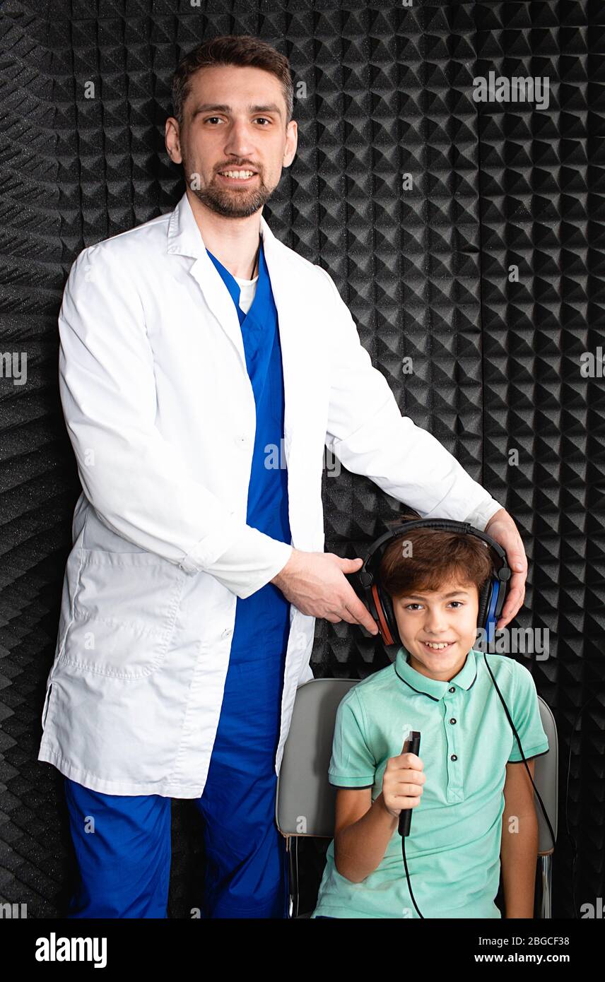 Child hearing headphones test doctor hi-res stock photography and ...