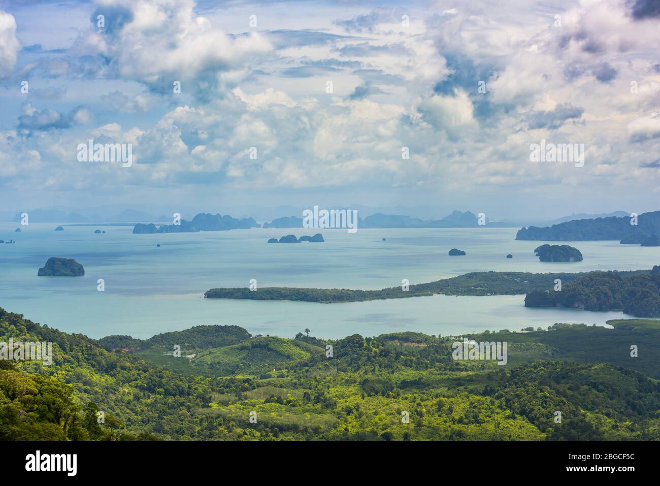 forest and sea view from rough and rocky mountain top Stock Photo - Alamy