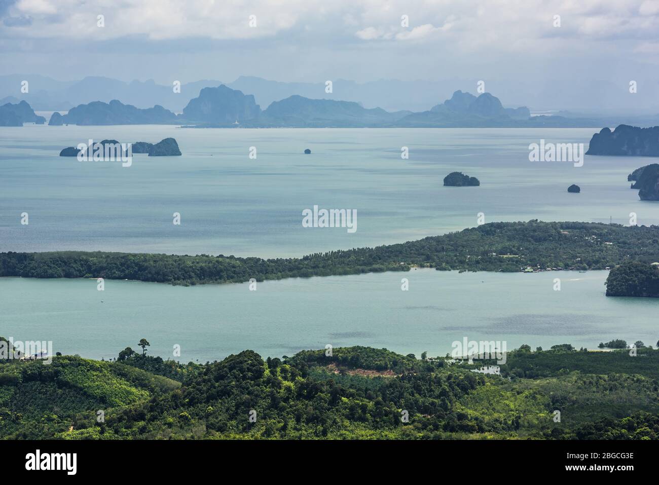 forest and sea view from rough and rocky mountain top Stock Photo - Alamy