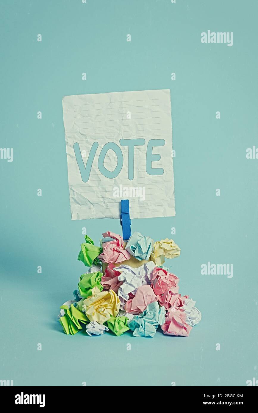 Writing note showing Vote. Business concept for Act of expressing a ...