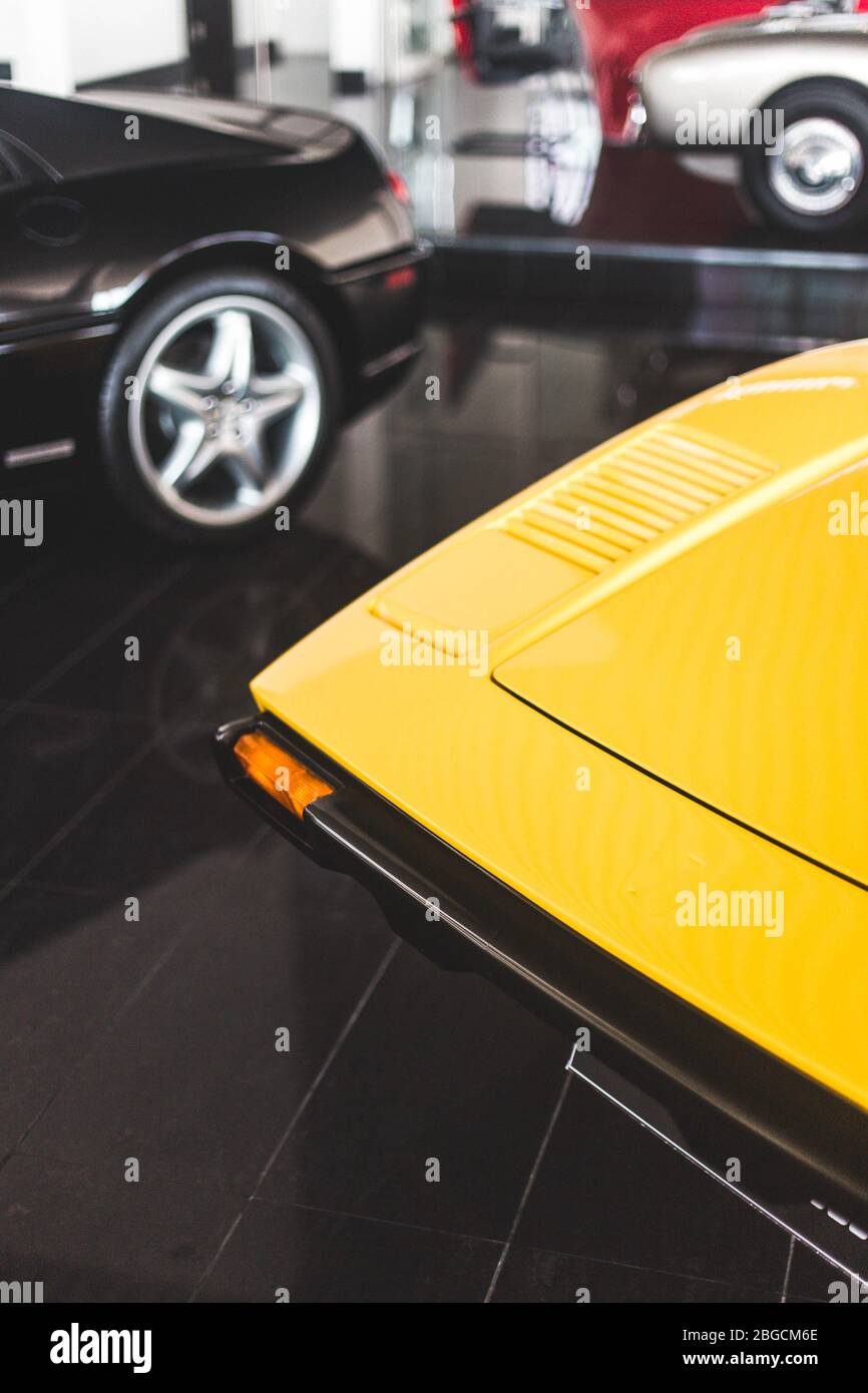 Multiple design sport car in the performance center Stock Photo - Alamy