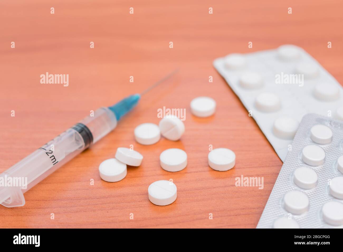 Syringe with injection and pills for treating patients in a hospital or ...