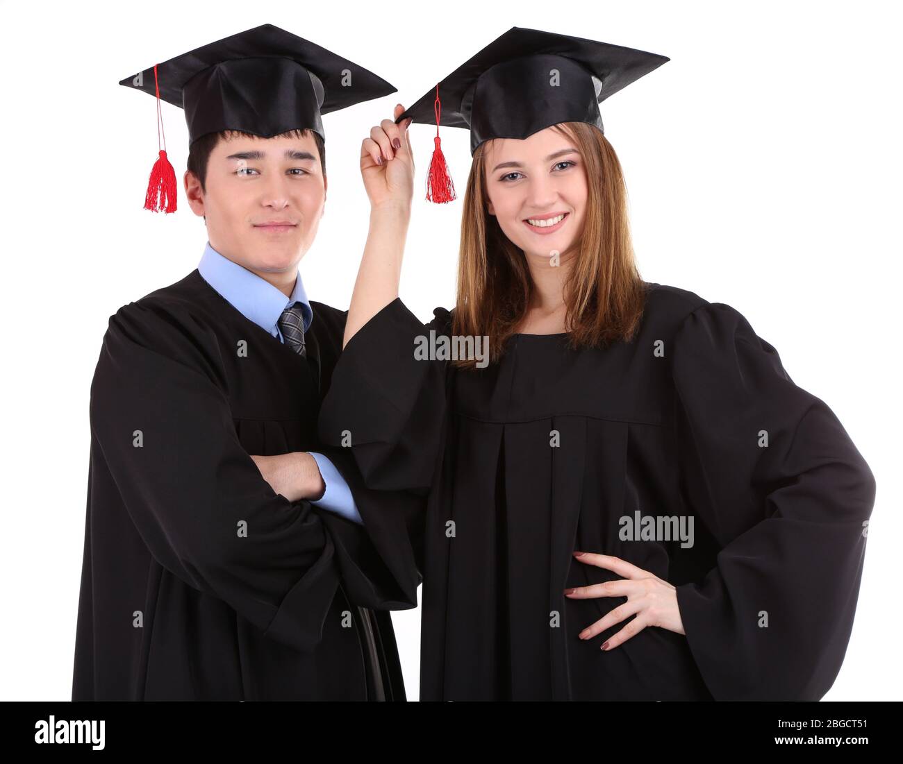 Two happy graduating students isolated on white Stock Photo - Alamy