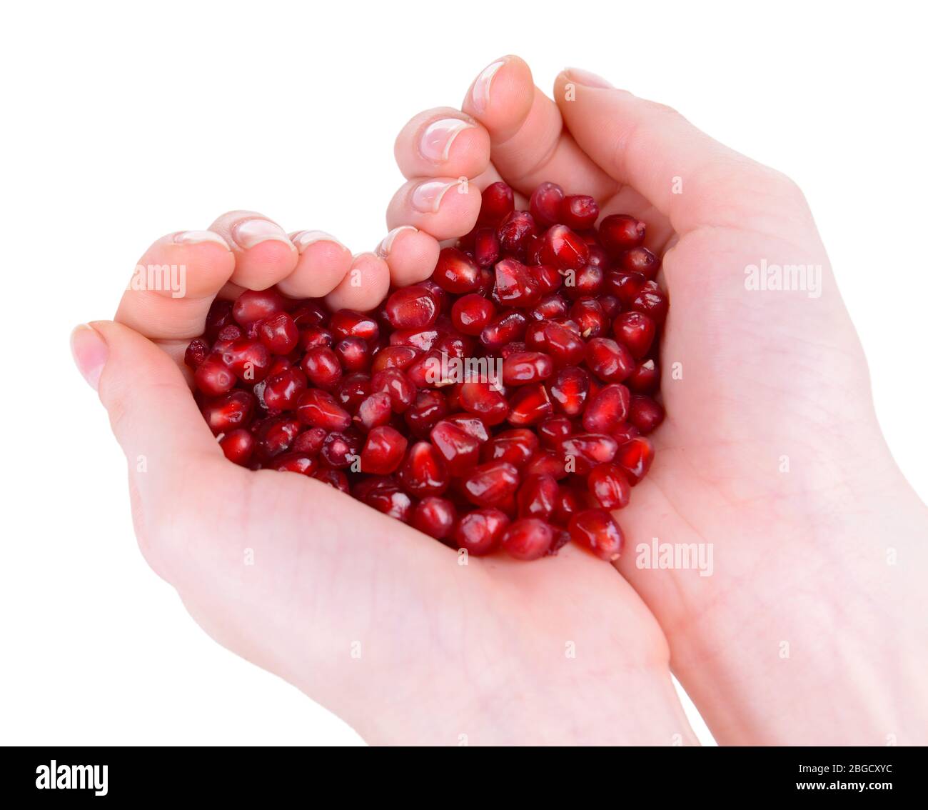 Pomegranate in hands hi-res stock photography and images - Alamy