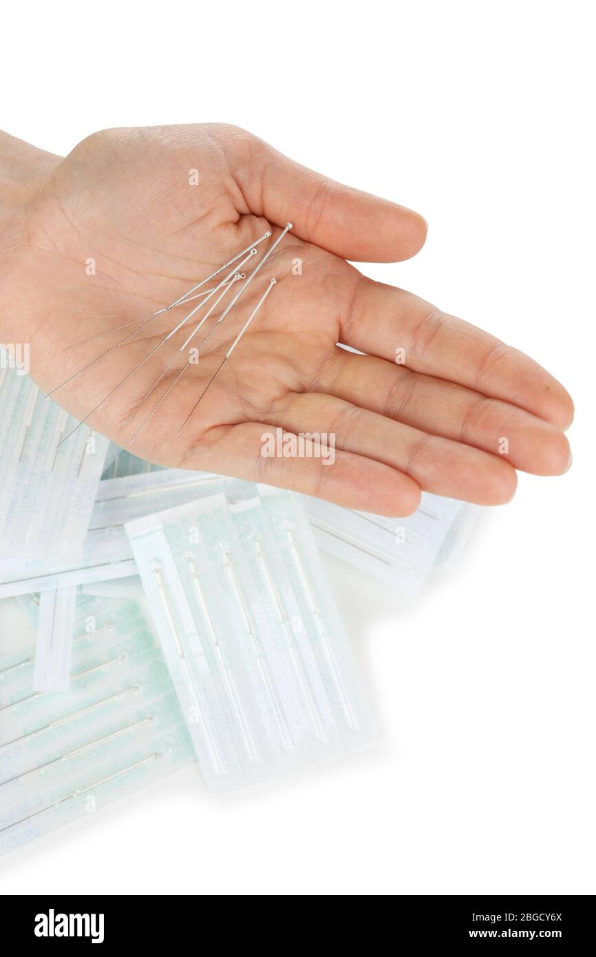 Needles for acupuncture on hand, close up Stock Photo - Alamy