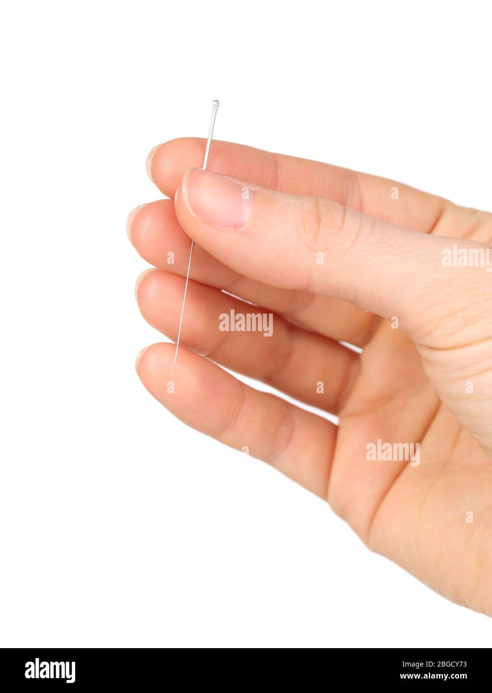 Hand holding needle for acupuncture on hand, close up. Isolated on ...