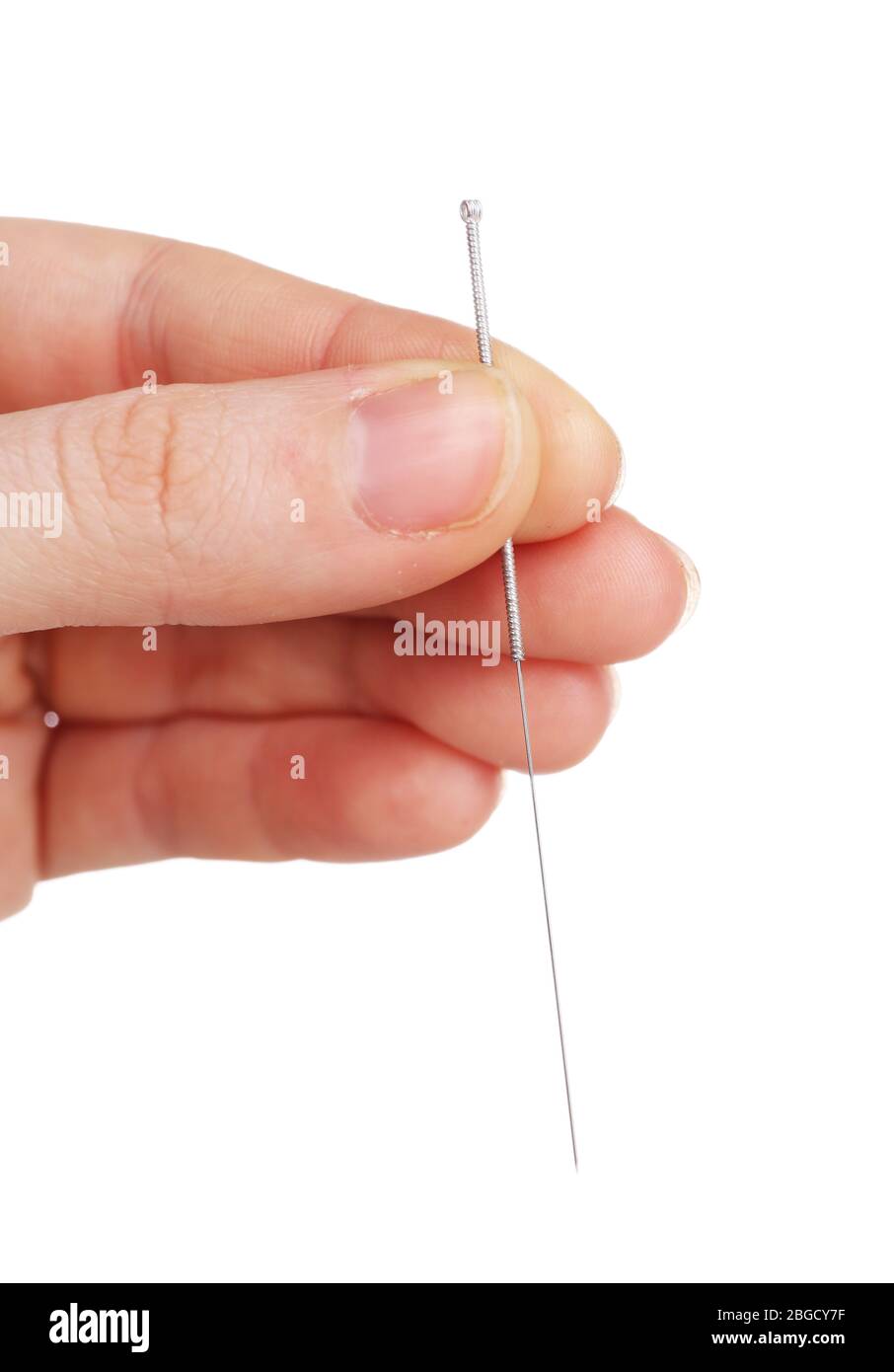 Hand holding needle for acupuncture on hand, close up. Isolated on ...