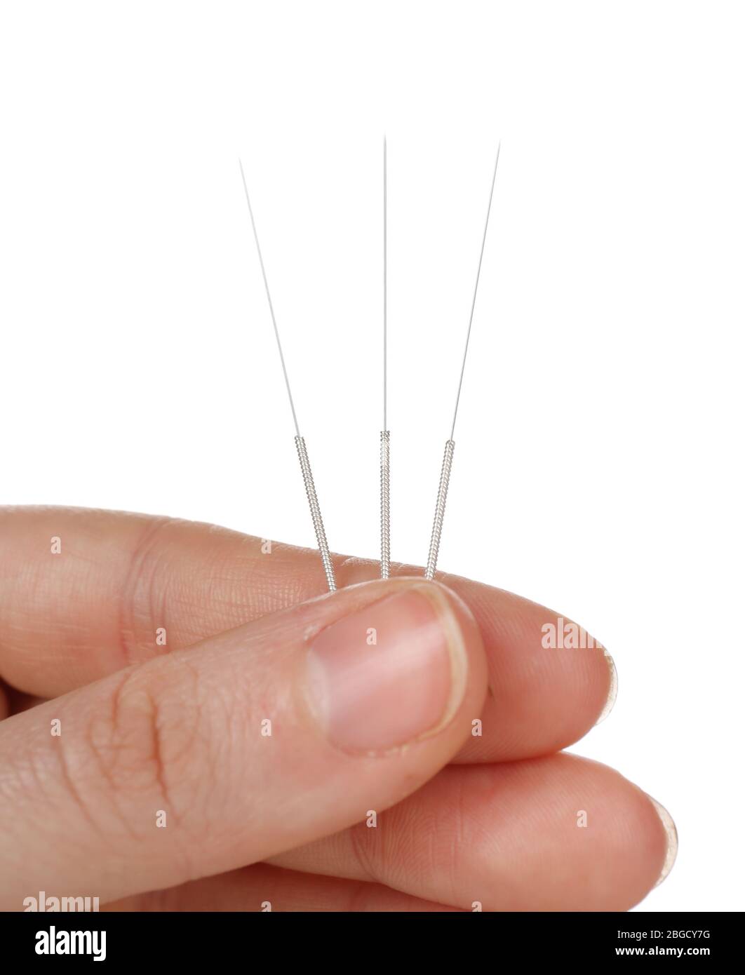 Woman holding acupuncture needles hi-res stock photography and images ...