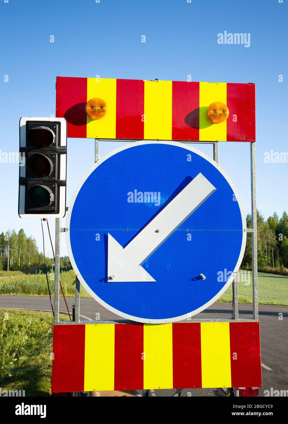 Finnish movable " pass this side " traffic sign with traffic lights ...