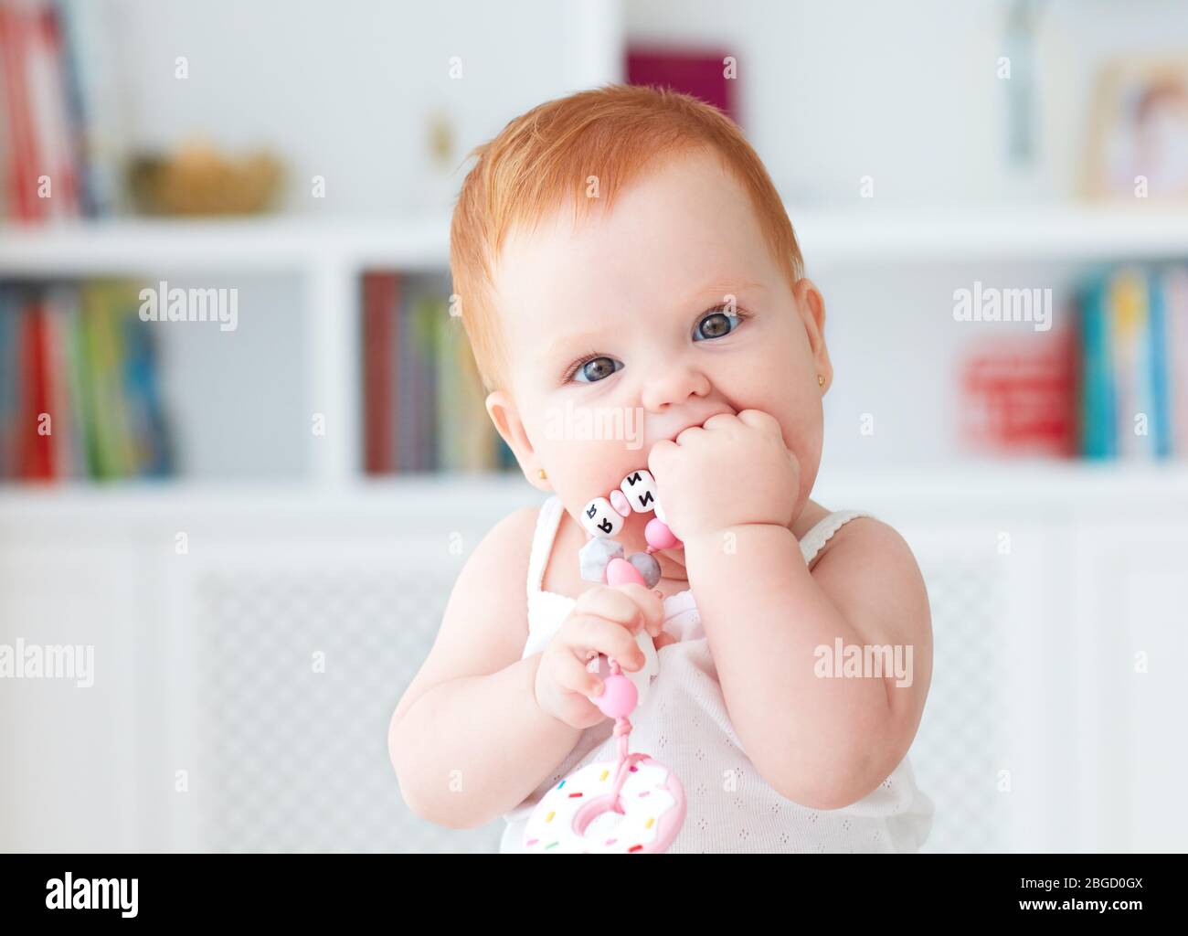 Infant biting toy hi-res stock photography and images - Alamy