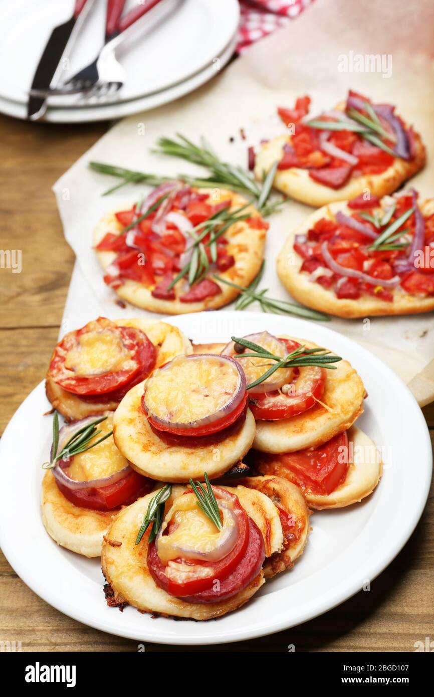 Small pizzas close up Stock Photo - Alamy