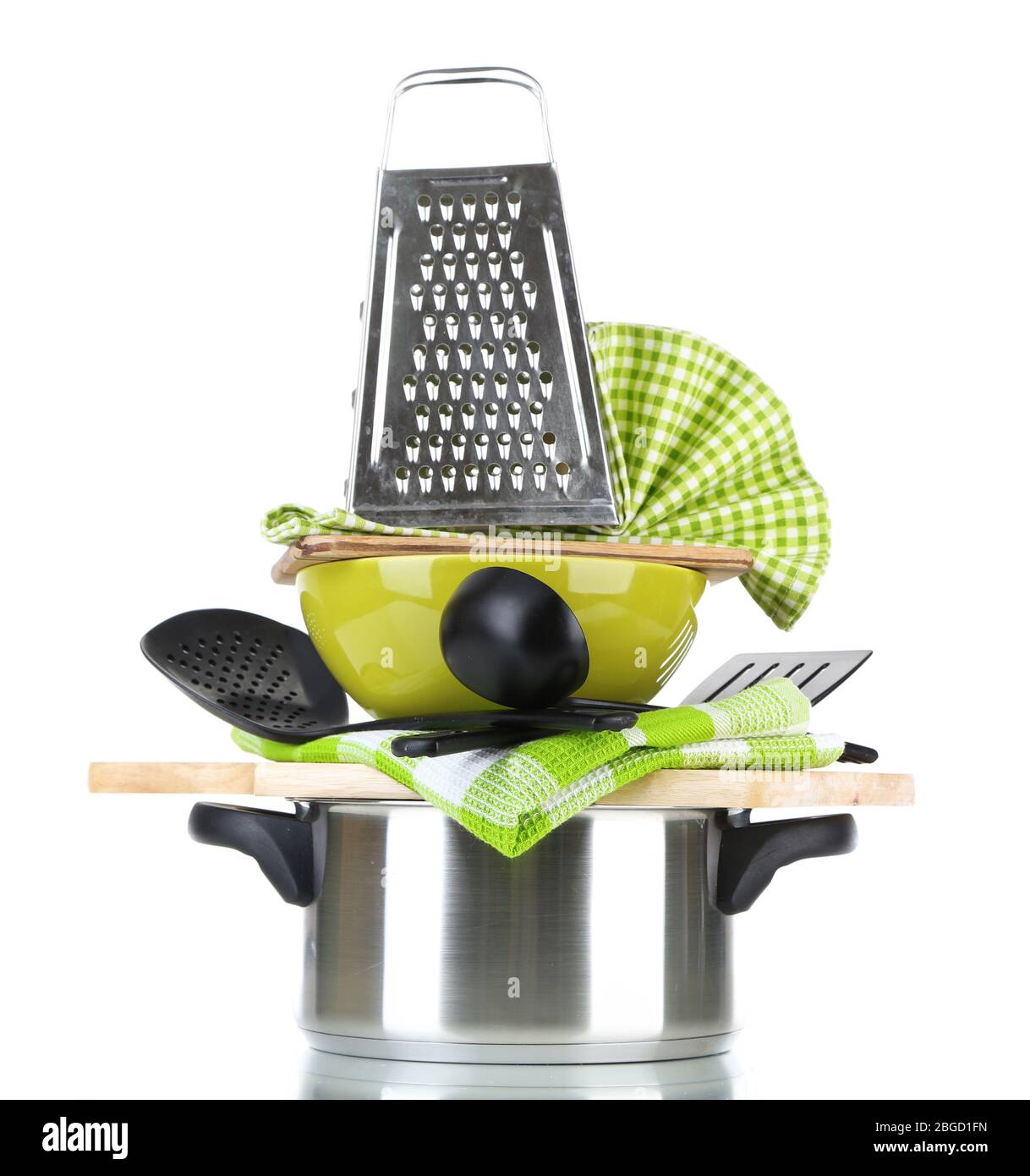 Stacked cooking equipment isolated on white Stock Photo - Alamy