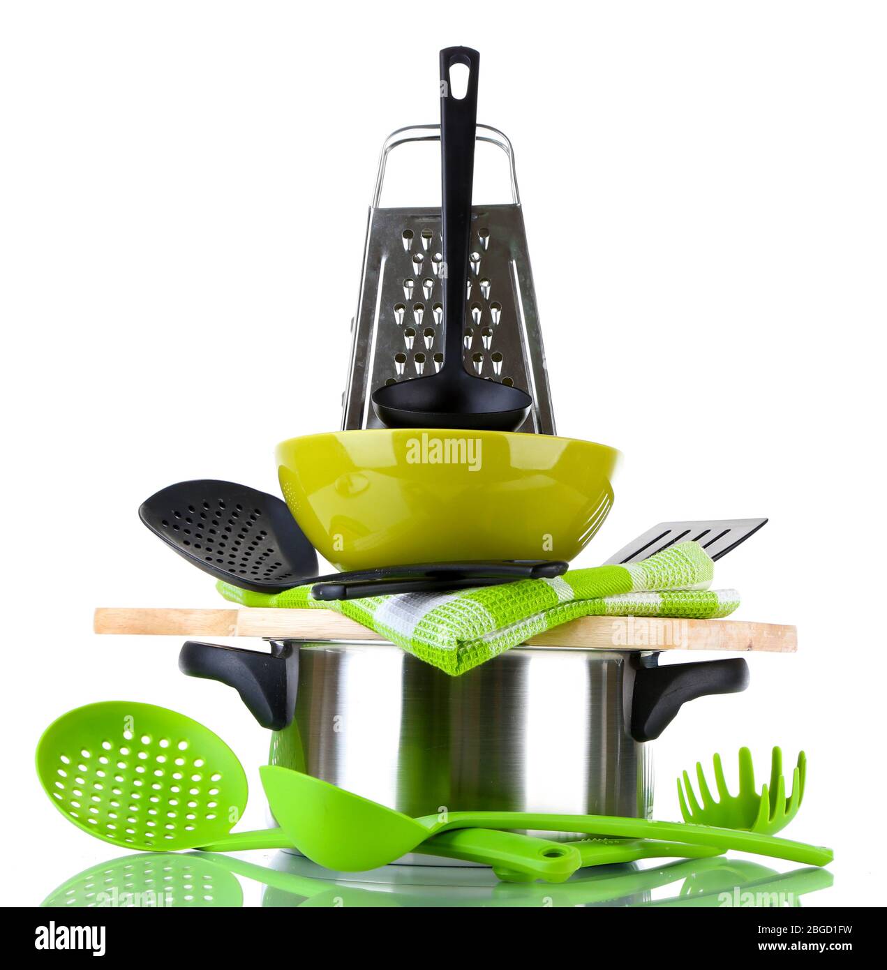 Stacked cooking equipment isolated on white Stock Photo - Alamy