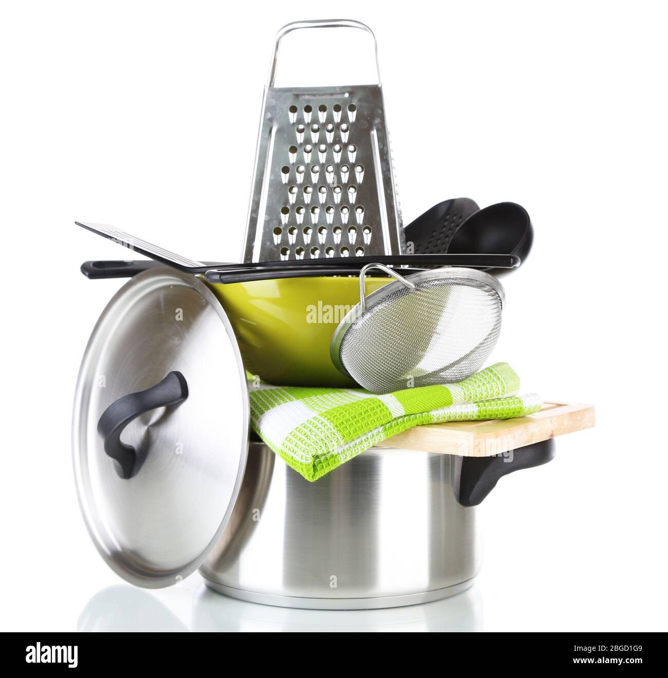 Stacked cooking equipment isolated on white Stock Photo - Alamy