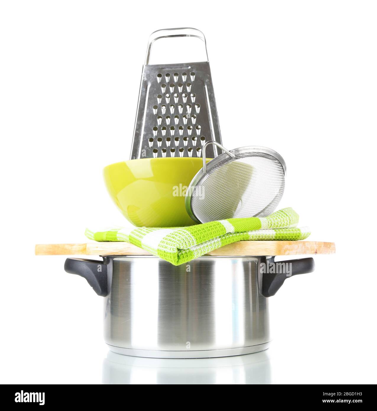 Stacked cooking equipment isolated on white Stock Photo - Alamy