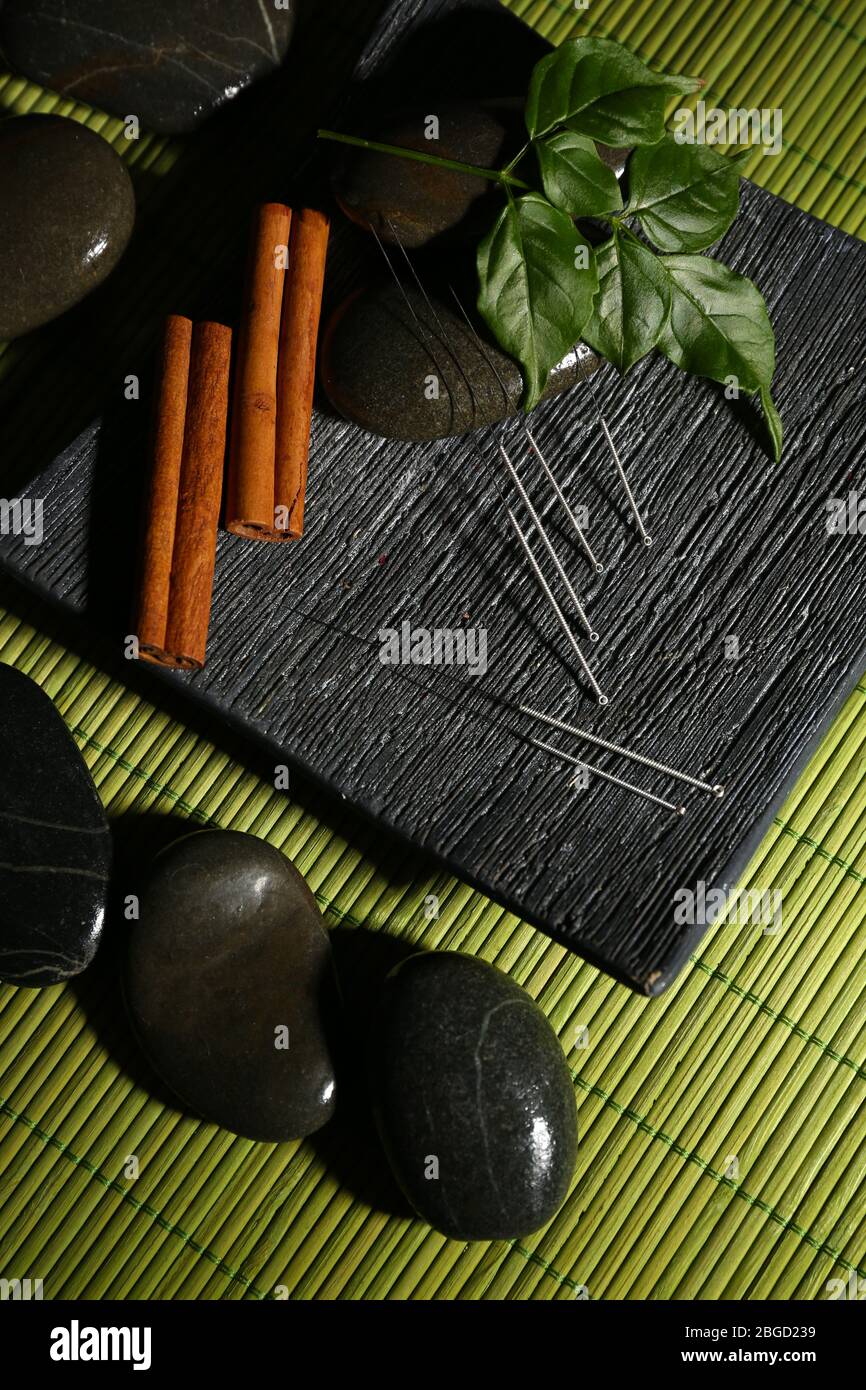 Composition with needles for acupuncture, close up Stock Photo - Alamy