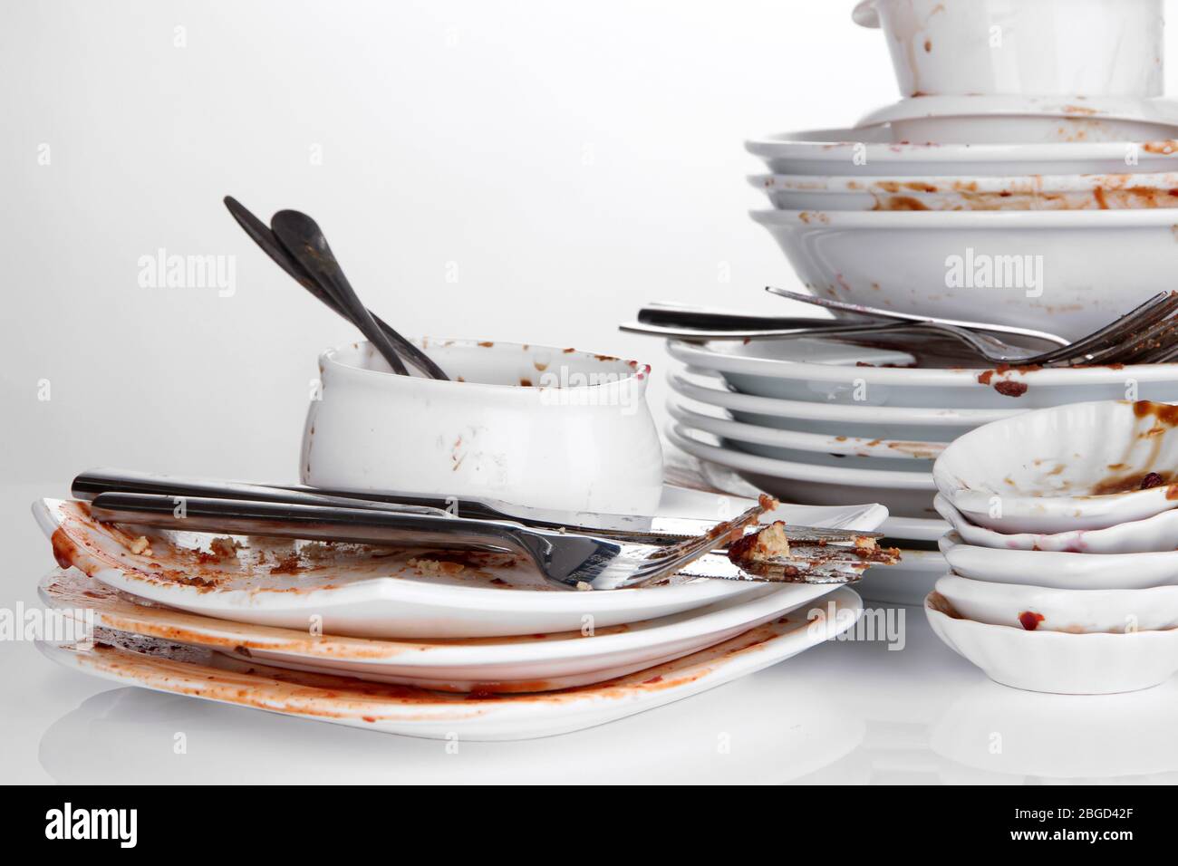 Dirty dishes isolated on white Stock Photo - Alamy